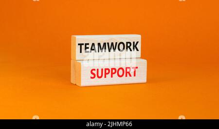Teamwork support symbol. Concept words Teamwork support on wooden ...