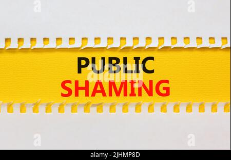 Public shaming symbol. Concept words Public shaming on wooden blocks on ...