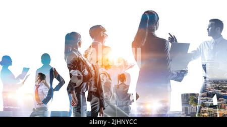 Group of business people outlines with lit background Stock Photo - Alamy