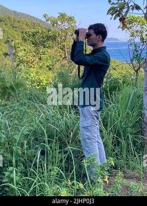 Son Tra Peninsula, Vietnam. 27th June, 2022. Red-legged dress monkeys ...