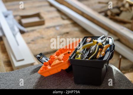 Tool box in apartment renovation area on floor Stock Photo - Alamy