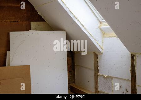House insulation layers, styrofoam, polyurethane foam, wood, drywall ...