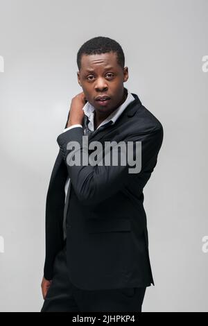 Afroamerican guy in expensive fancy black suit Stock Photo - Alamy