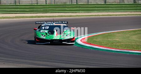 Racing car Lamborghini Huracan GT3 with wheels dismounted without tyres ...