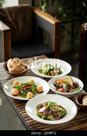 Mixed food, there are different dishes on the table Stock Photo - Alamy