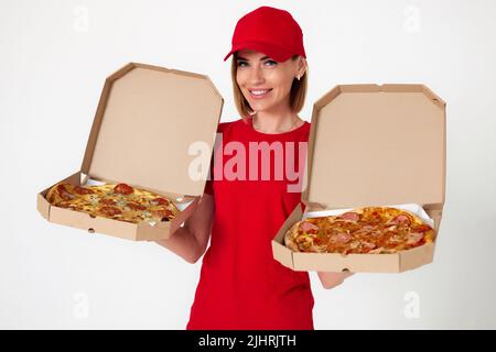 pizza delivery girl showing pizza inside boxes Stock Photo - Alamy