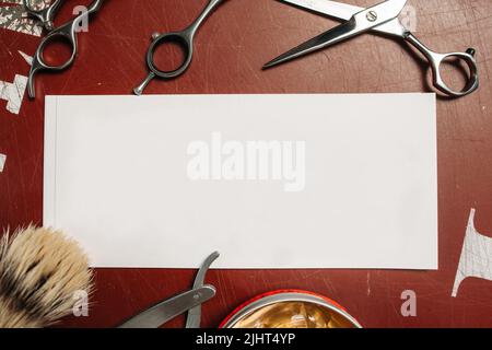 Blank card with barber tools flat lay Stock Photo - Alamy