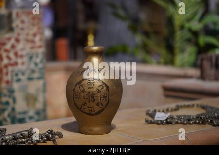 Pottery, a vase, a jug of brown clay, and the founding day of Saudi ...