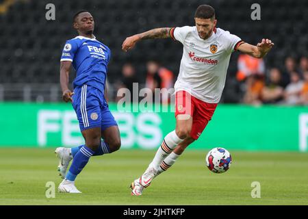 Tobias Figueiredo #6 of Hull City takes the ball away from Dennis Praet ...