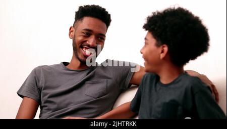 Two brothers talk interaction, black african siblings in conversation ...
