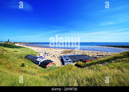Tynemouth Long sands beach wideangle vista with canoeists surfers deep ...