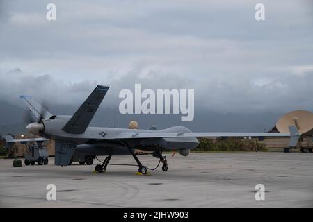 An MQ-9 Reaper assigned to the 163rd Attack Wing sits in the 178th ...