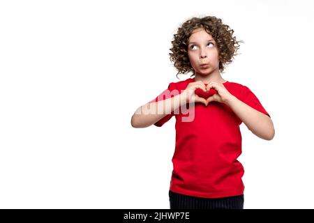 Child Curly-haired schoolgirl 10-12s in white blouse and round glasses ...