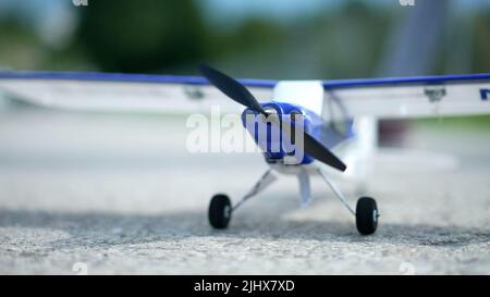 Starting Airplane model propellers. Toy small plane Stock Photo - Alamy