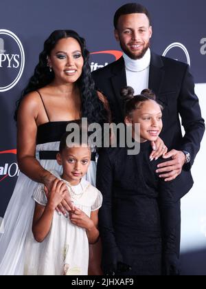Ryan Curry, Ayesha Curry, Riley Curry, and Stephen Curry attend the ...