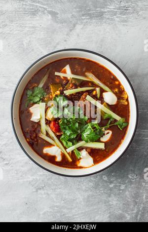 plant-based Mexican vegetable stew with beans mock meat celeri and ...