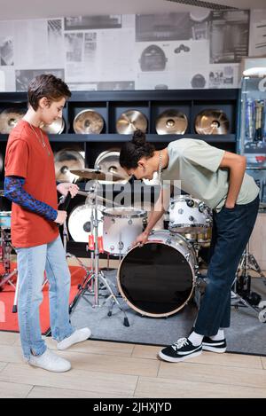 A side view of a drum set Stock Photo - Alamy