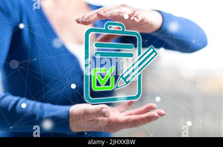 Document validation concept between hands of a woman in background ...