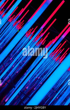 Abstract red LED light poles in infinity mirror room Stock Photo - Alamy