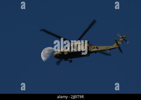 A UH-60 Blackhawk flies overhead during the Week of the Bayonet ...