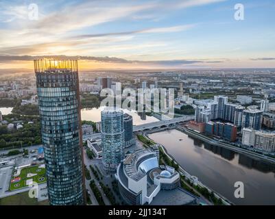 Yekaterinburg city and pond aerial panoramic view at summer sunset ...