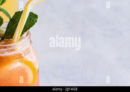 Close up of partially seen fresh fruit cocktails Stock Photo - Alamy