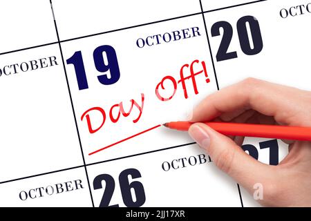 19th day of October. Hand writing the text HAPPY DAY and drawing the ...