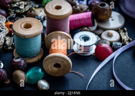 Retro threads and aged buttons Stock Photo - Alamy