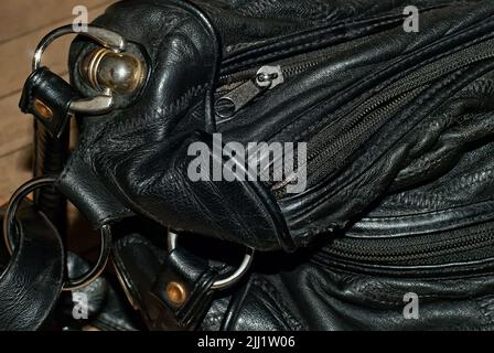 closeup of buckles, clasps, zippers, pockets, fasteners, fittings and ...