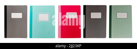 Top view of a blank notebook and various school supplies on a yellow ...