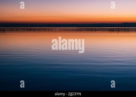 Sunset on the calm waters of Albufera lagoon, Valencia, Spain Stock ...