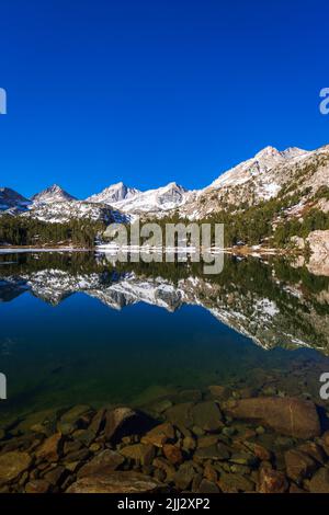 Sierra peaks reflected in Long Lake, Little Lakes Valley, John Muir ...