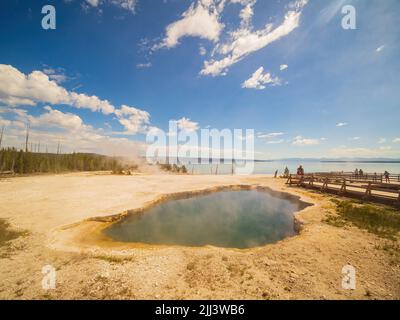 Sunny beautiful landscape of Abyss Pool in West Thumb of Yellowstone ...