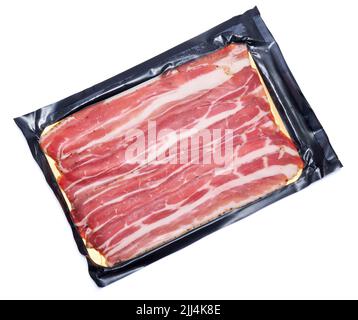chilled pork bacon in plastic vacuum packaging on a white background ...