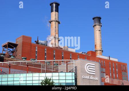 The Con Edison East River Generating Station with two steel stacks set ...