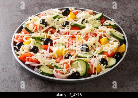 Shopska salata vegetables Chopped Salad with cheese closeup in the ...