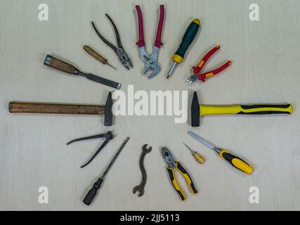 Old rusty tools versus modern tools on the OSB sheet. Concept ...