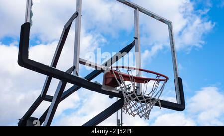Broken glass backboard and broken hoop on the basketball court Stock ...
