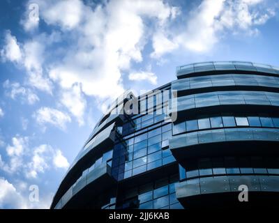 A modern building facade during the daytime Stock Photo - Alamy