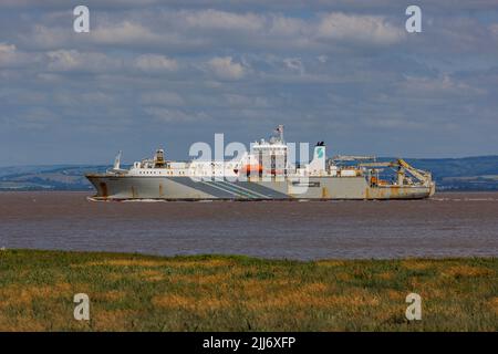 Cable layer Decisive heading out to sea Stock Photo - Alamy