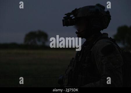 An explosive ordnance disposal technician with Marine Forces Special ...