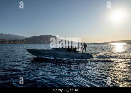 A U.S. Naval Special Warfare Combatant-Craft Crewmen with Special Boat ...