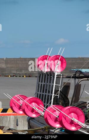 Colourful squid jigging machine Stock Photo - Alamy