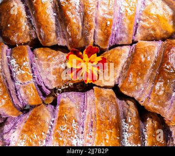 Fresh baked home made Ube Croissants using flavouring and purple yam ...