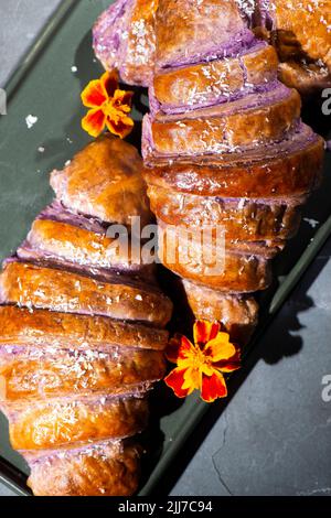 Fresh baked home made Ube Croissants using flavouring and purple yam ...