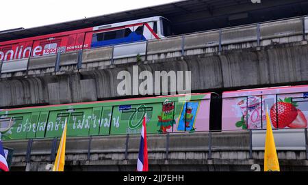 BTS Skytrains, part of an elevated rapid transit system in Bangkok ...