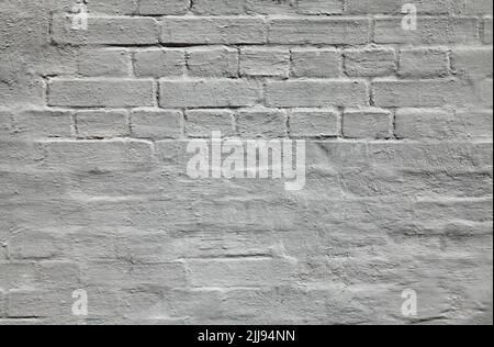 Grey building wall, painted with whiting. Wavy and bumpy surface. Brick ...