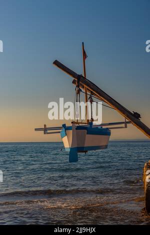 Boat over Jadran sea in Izola town in hot middle summer blue sky fresh ...