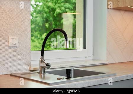 Modern kitchen with sink near window, Empty kitchen background with ...