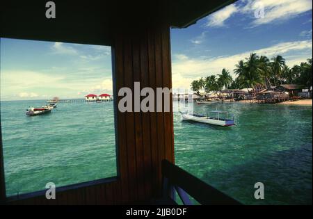 A view of fishing village as seen through windows of a cottage built ...